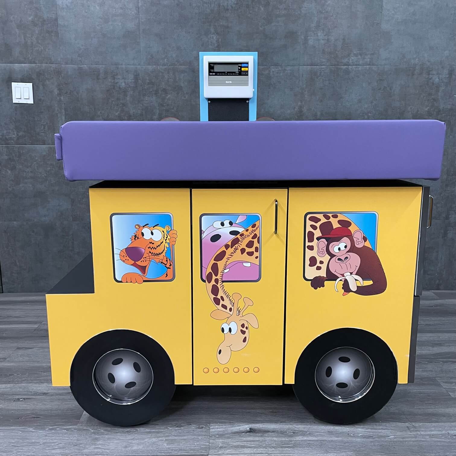 Clinton Zoo Bus Pediatric Exam Table - – Angelus Medical and Optical